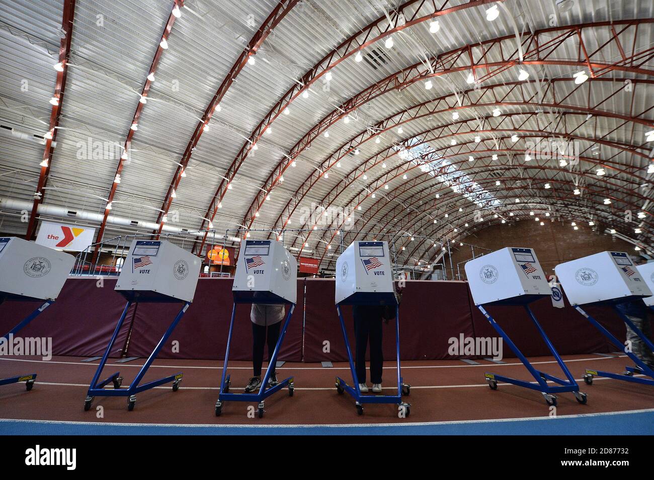 New York City, USA. 27th Oct, 2020. People fill out their ballots ...