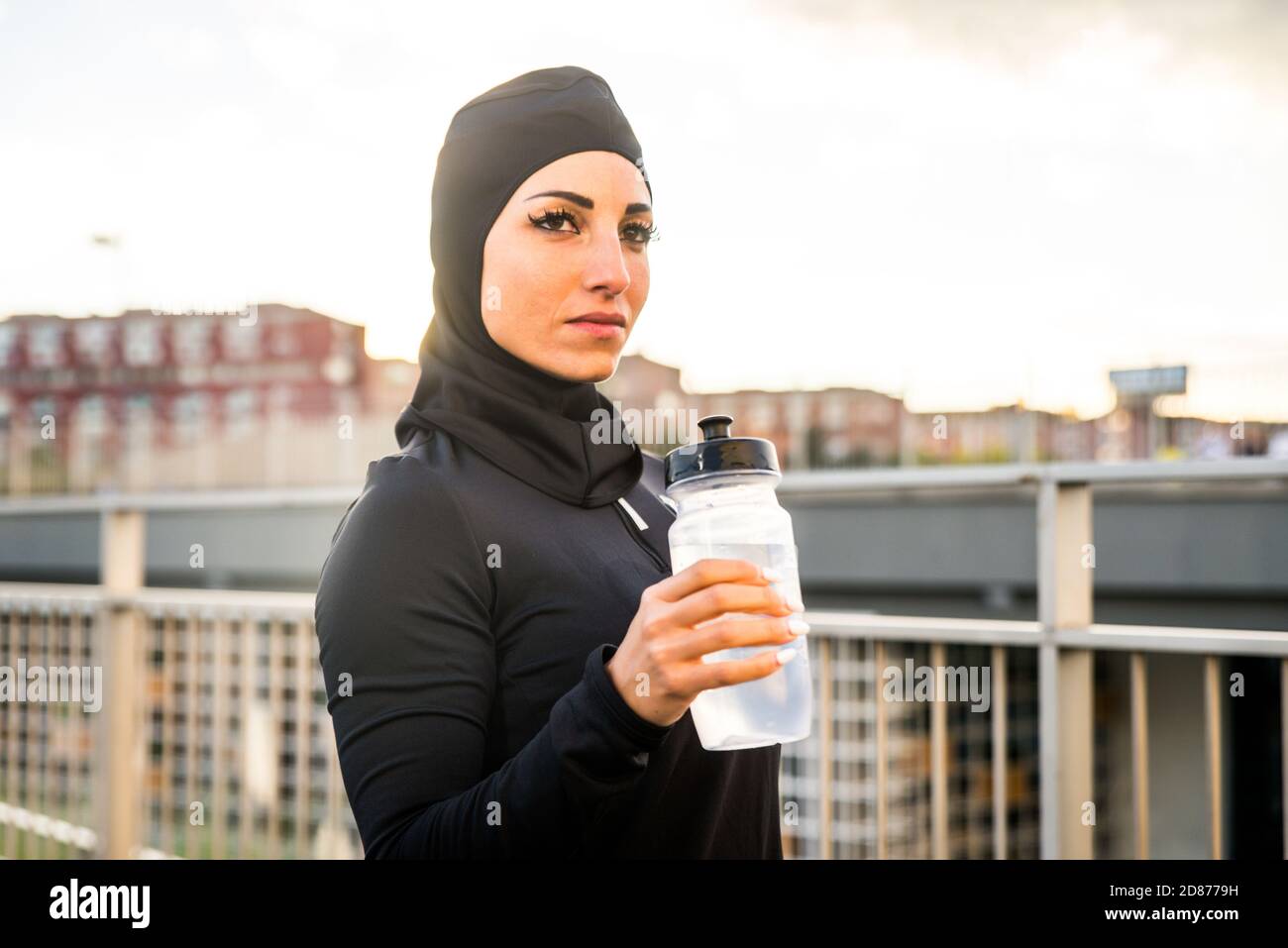 Muslim sportive girl with fit body training outside - Beautiful woman ...