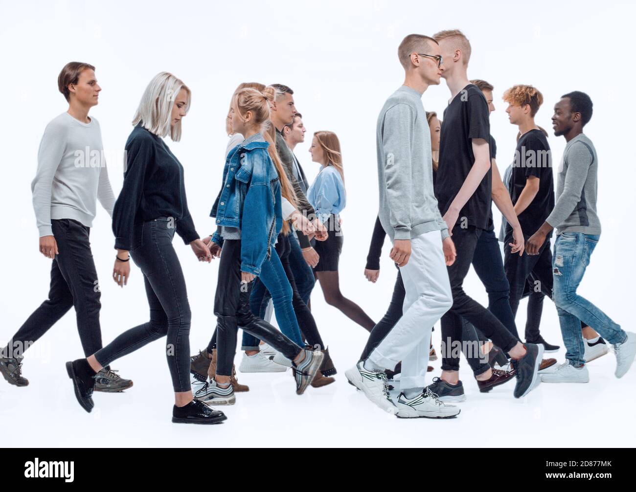 casual young people walking in different directions Stock Photo - Alamy
