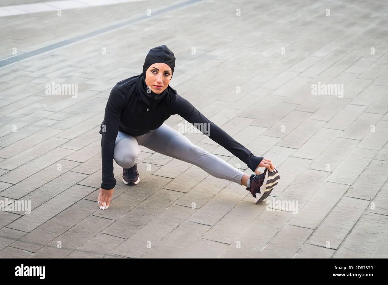 Muslim sportive girl with fit body training outside - Beautiful woman ...