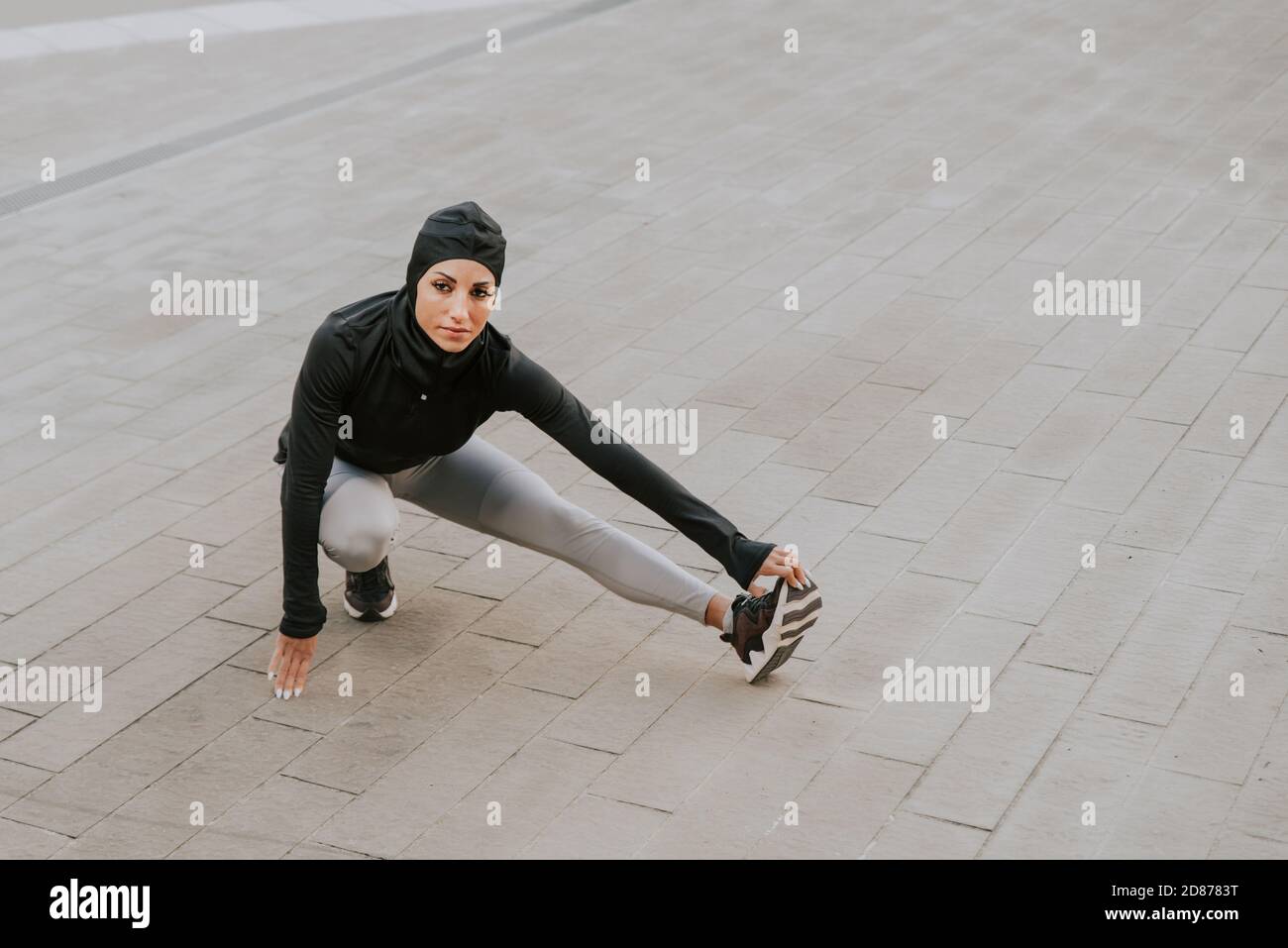 Muslim sportive girl with fit body training outside - Beautiful woman ...