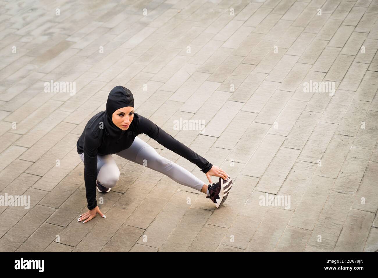 Muslim sportive girl with fit body training outside - Beautiful woman ...