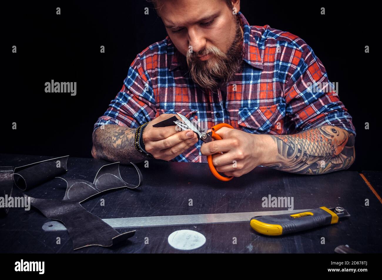 Handyman focusing on his work Stock Photo - Alamy