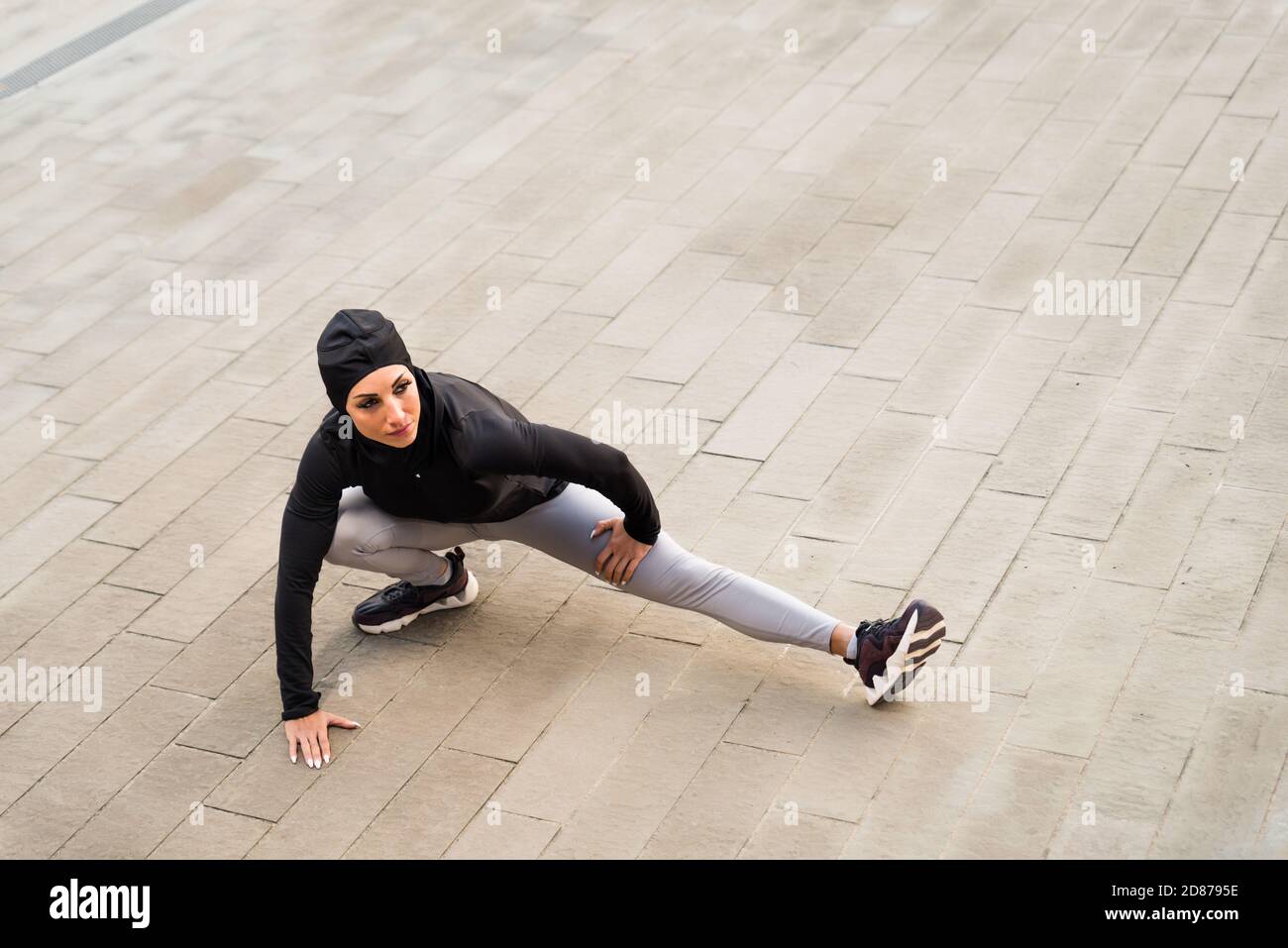 Muslim sportive girl with fit body training outside - Beautiful woman ...