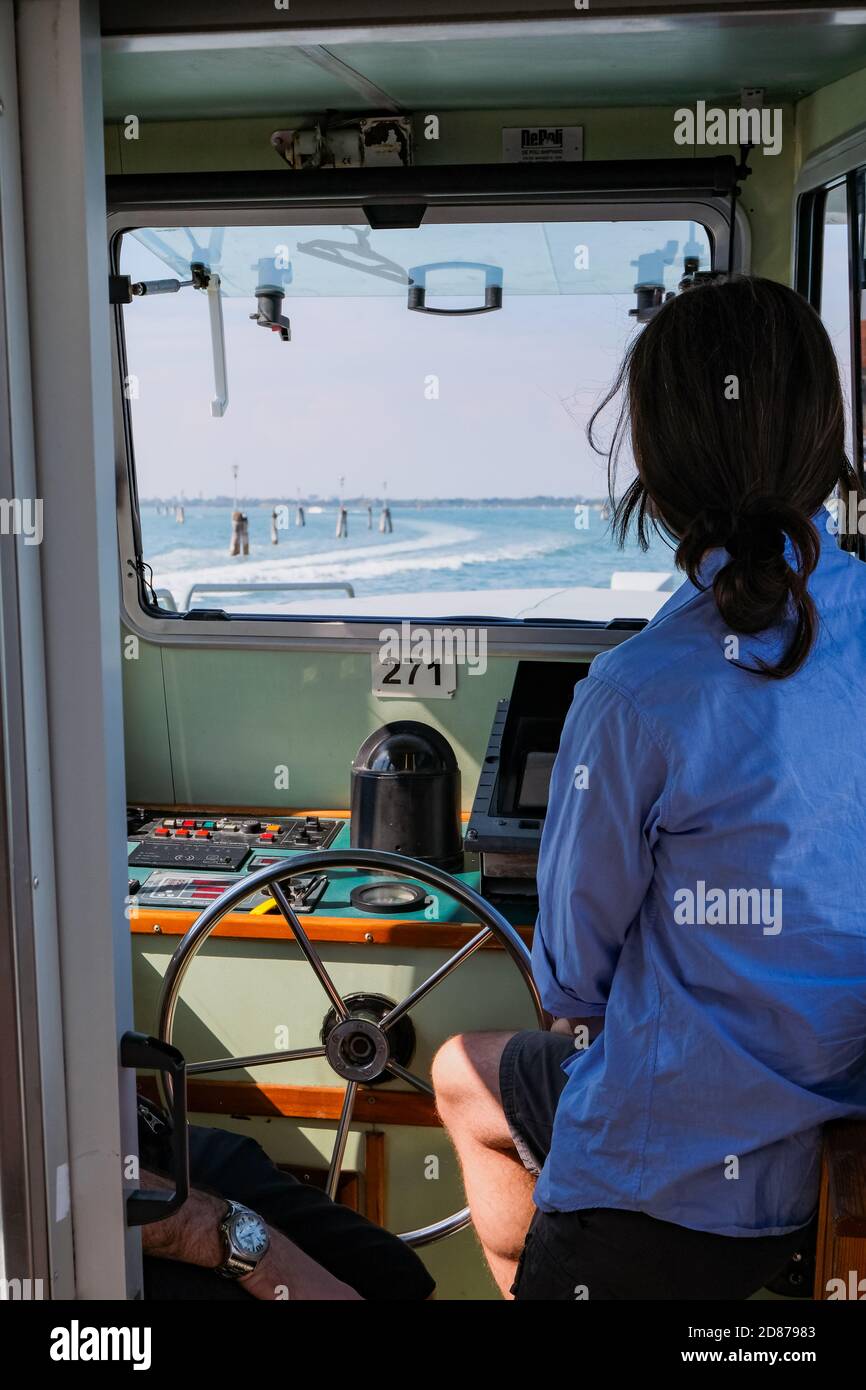 Boat Driver in Cabin of a Vaporetto in Venice Stock Photo - Alamy