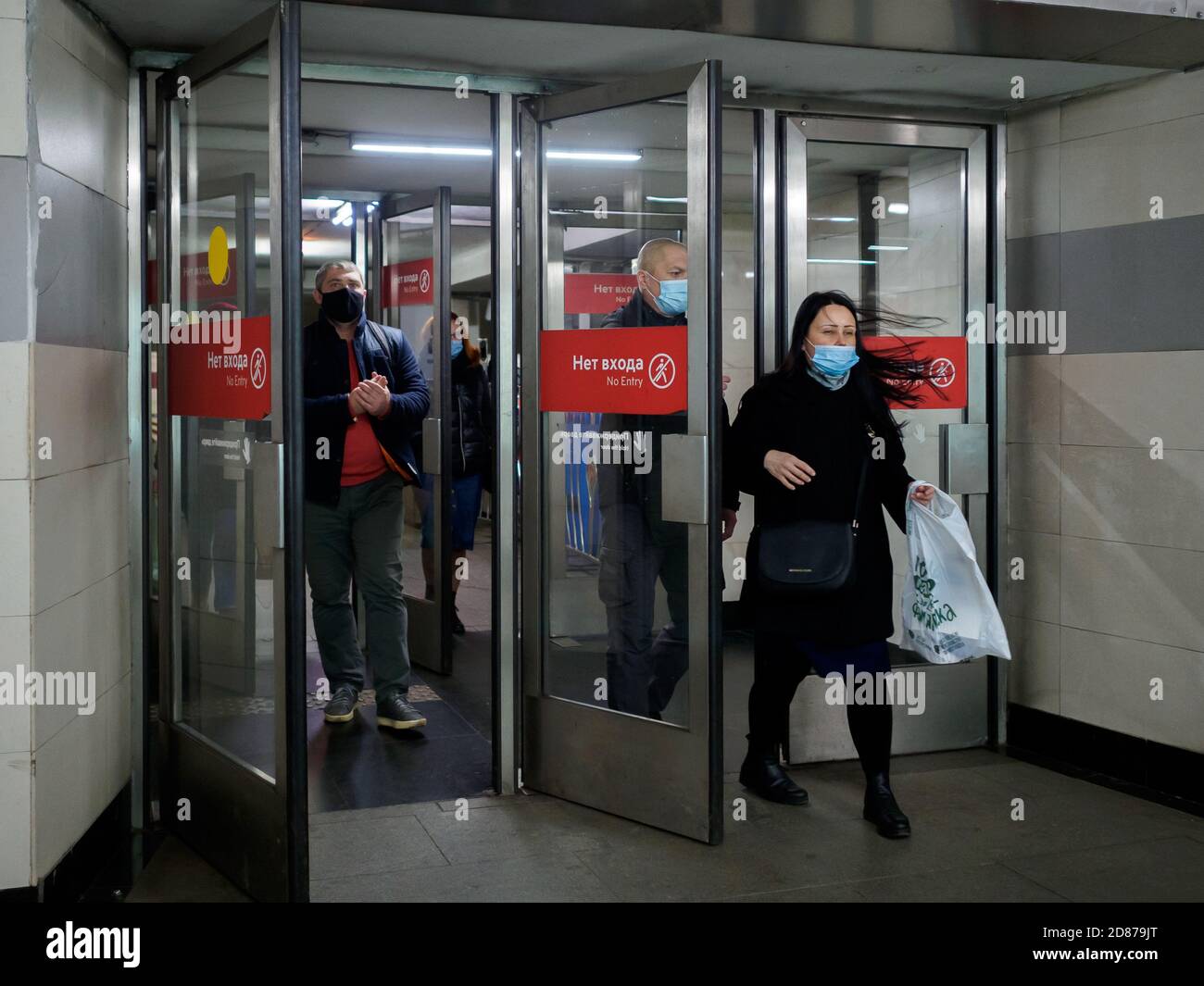 Moscow. Russia. October 26, 2020 Passengers wearing face masks leave ...