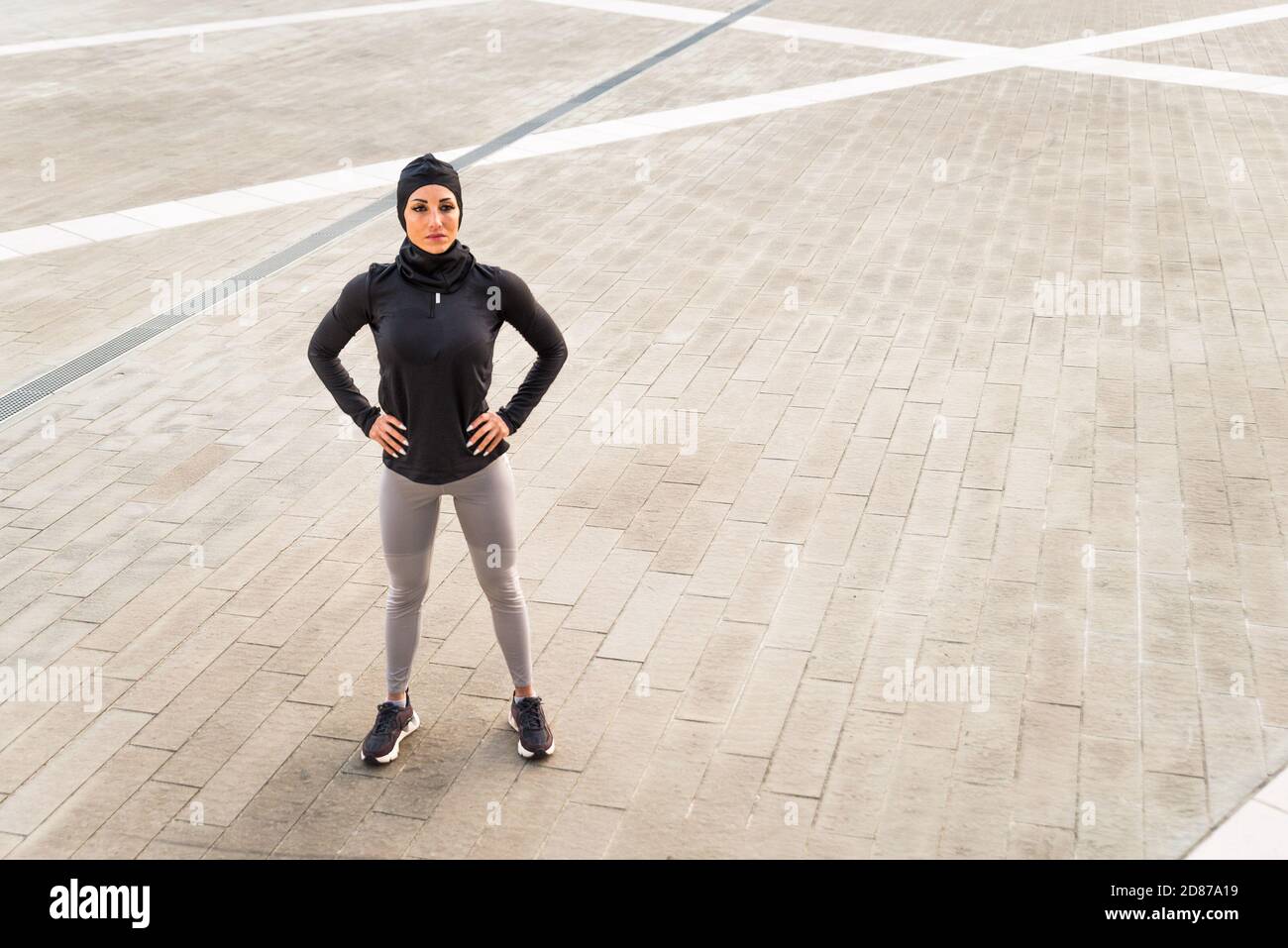 Muslim sportive girl with fit body training outside - Beautiful woman ...