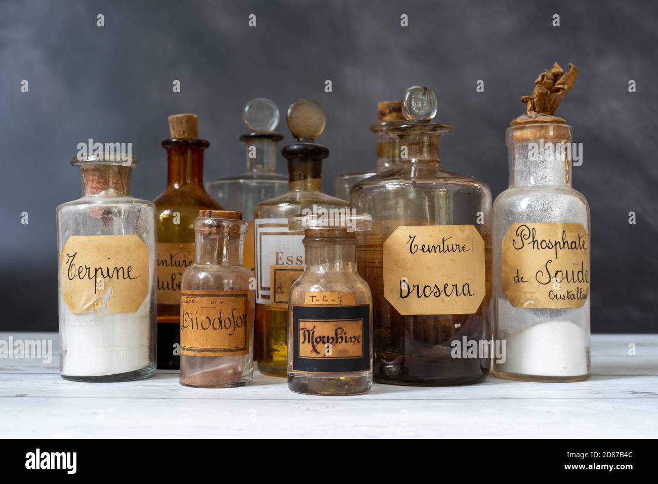 closeup of ancient apothecary pots with ingredients for medicine ...