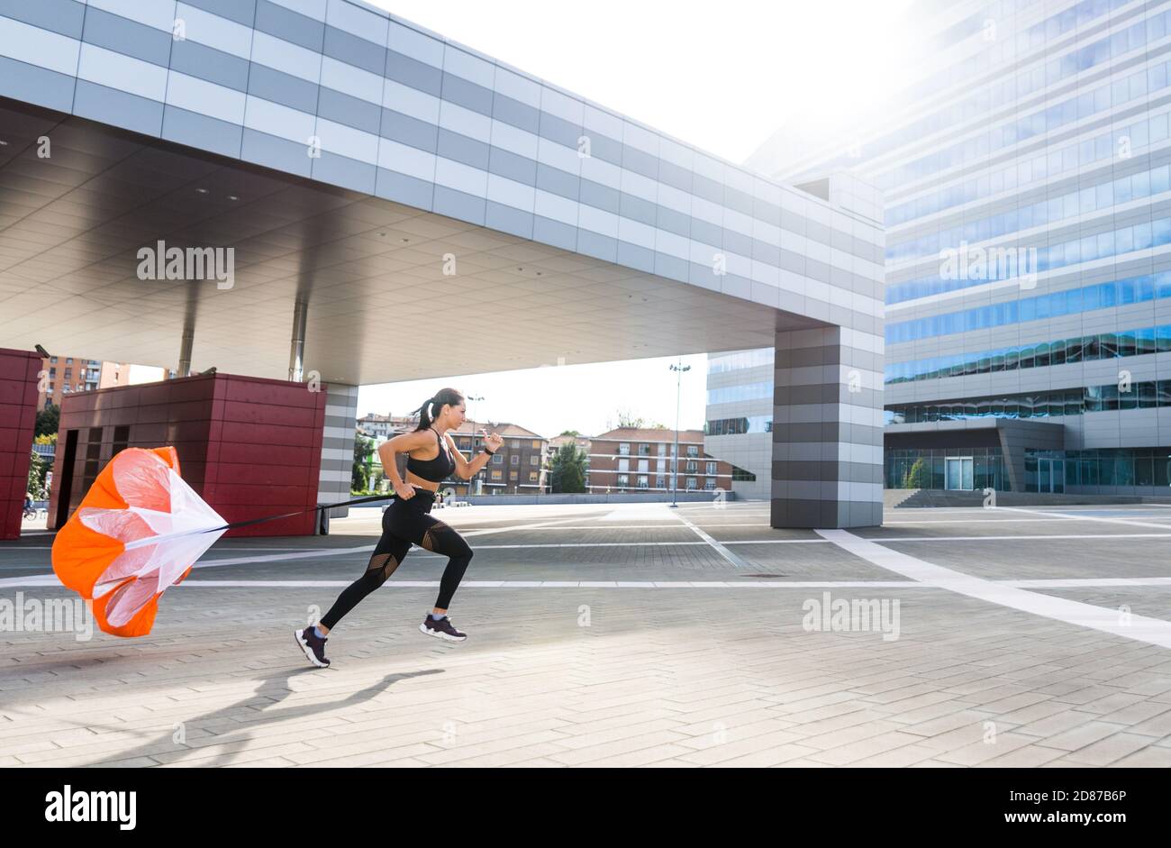 Sportive girl with fit body training outside - Beautiful woman doing ...