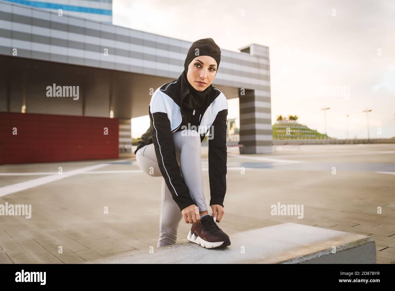 Muslim sportive girl with fit body training outside - Beautiful woman ...