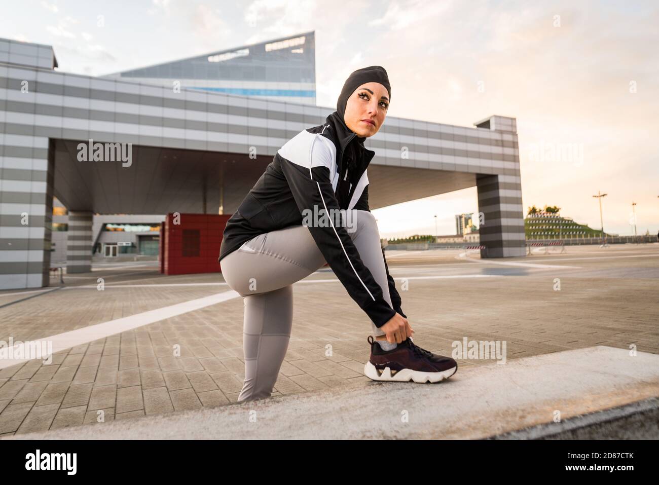 Muslim sportive girl with fit body training outside - Beautiful woman ...
