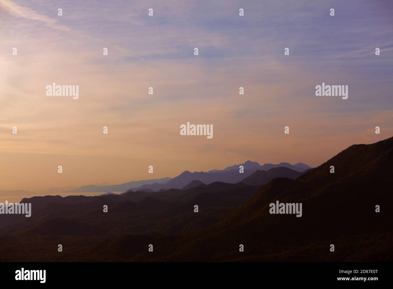 Mountains and sea blue hour scenery Stock Photo - Alamy