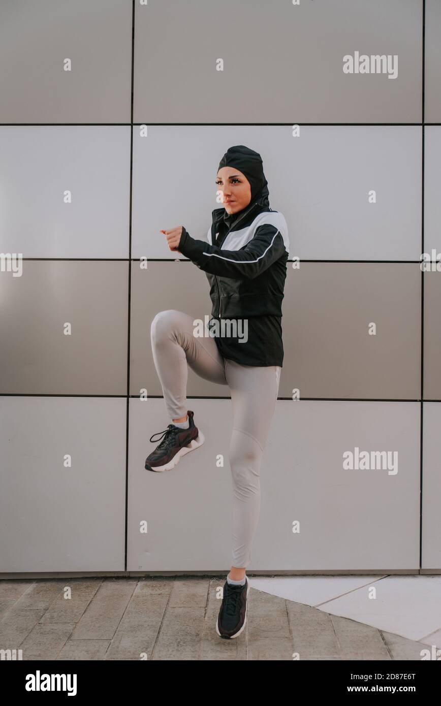 Muslim sportive girl with fit body training outside - Beautiful woman ...