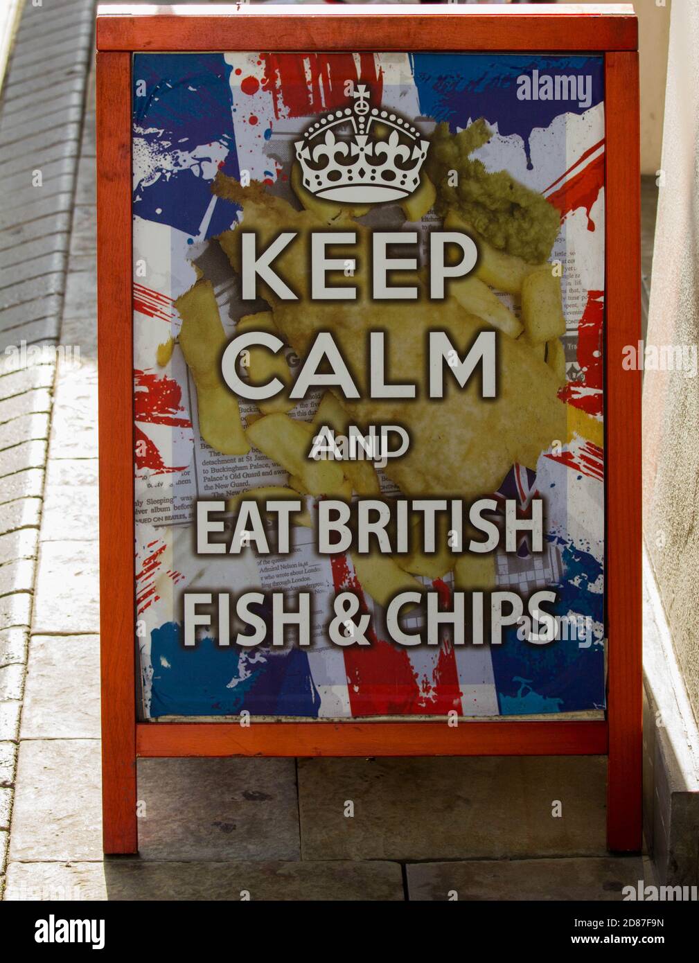 Sign advertising fish and chips in Gibraltar's Main Street Stock Photo ...