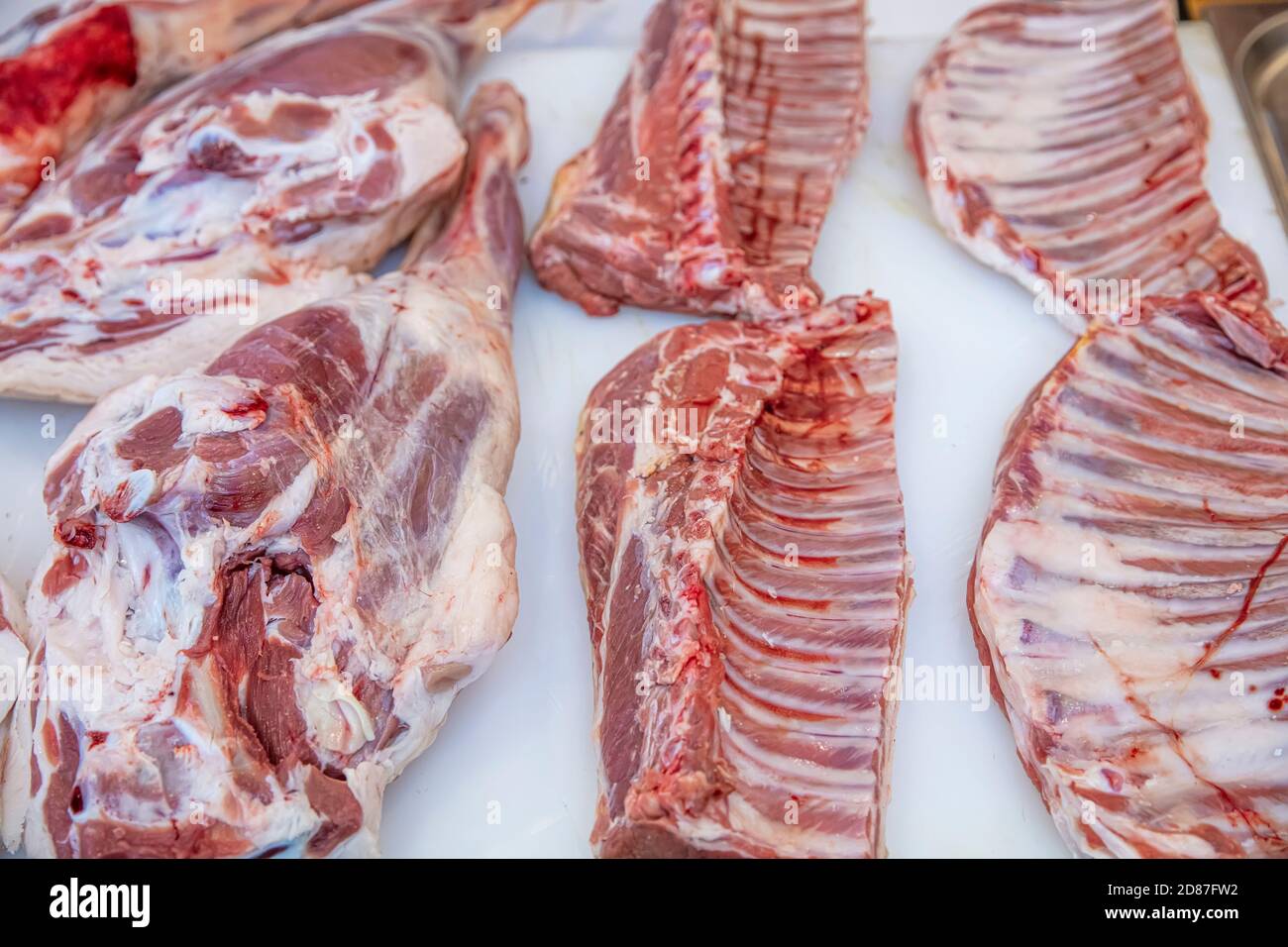 Fresh and raw meat. Assorted pieces of lamb on white background Stock ...