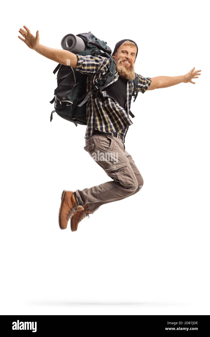 Happy bearded man hiker jumping isolated on white background Stock ...