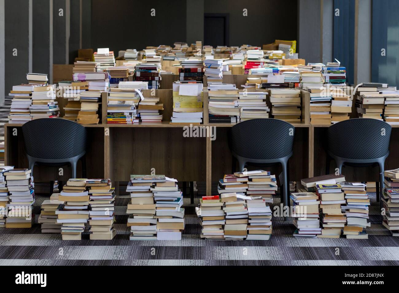 Books in a pile on top of each other Stock Photo - Alamy