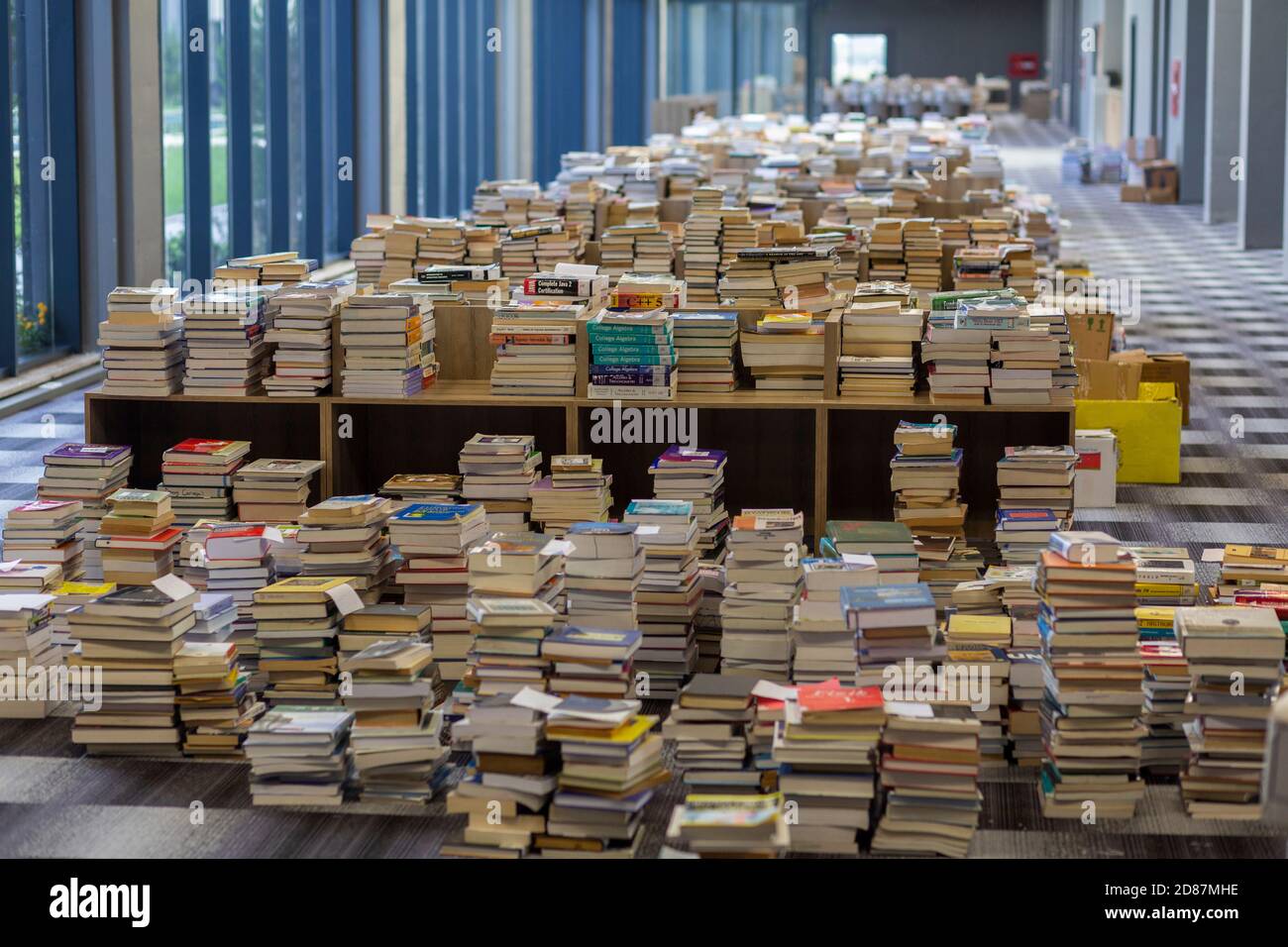 Books in a pile on top of each other Stock Photo - Alamy