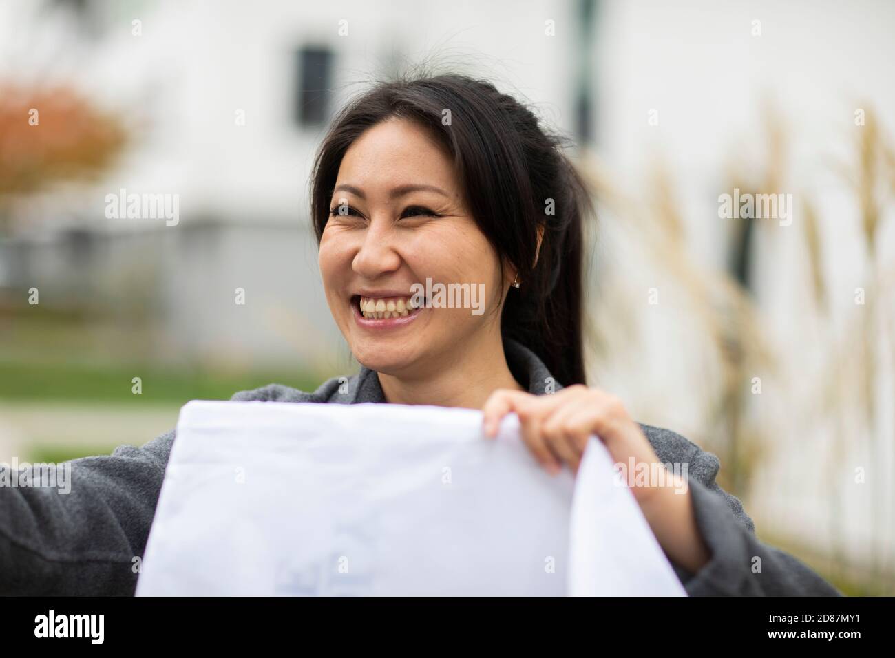 young woman as protester with sign Stock Photo - Alamy