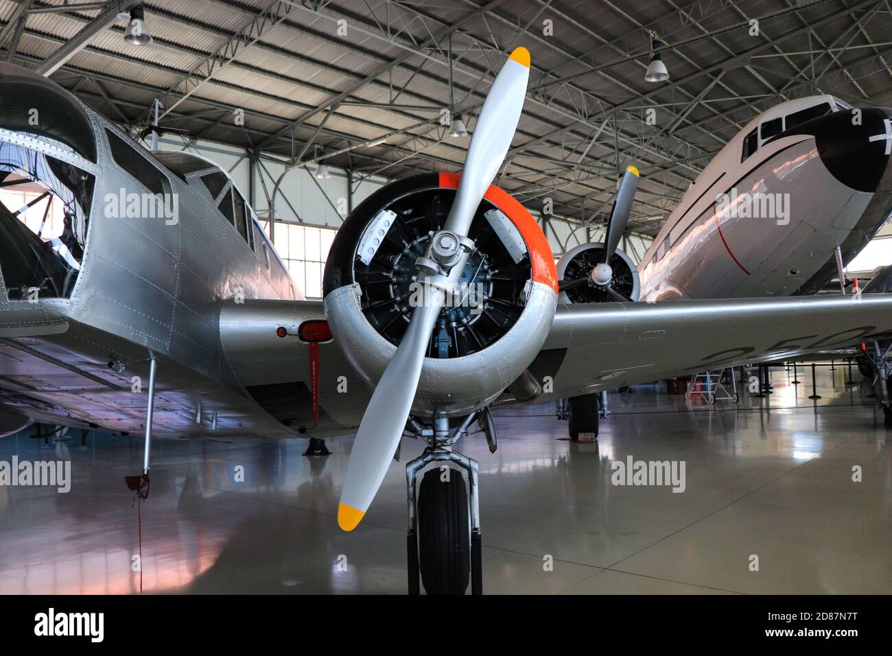 Old propeller plane in a hangar Stock Photo - Alamy