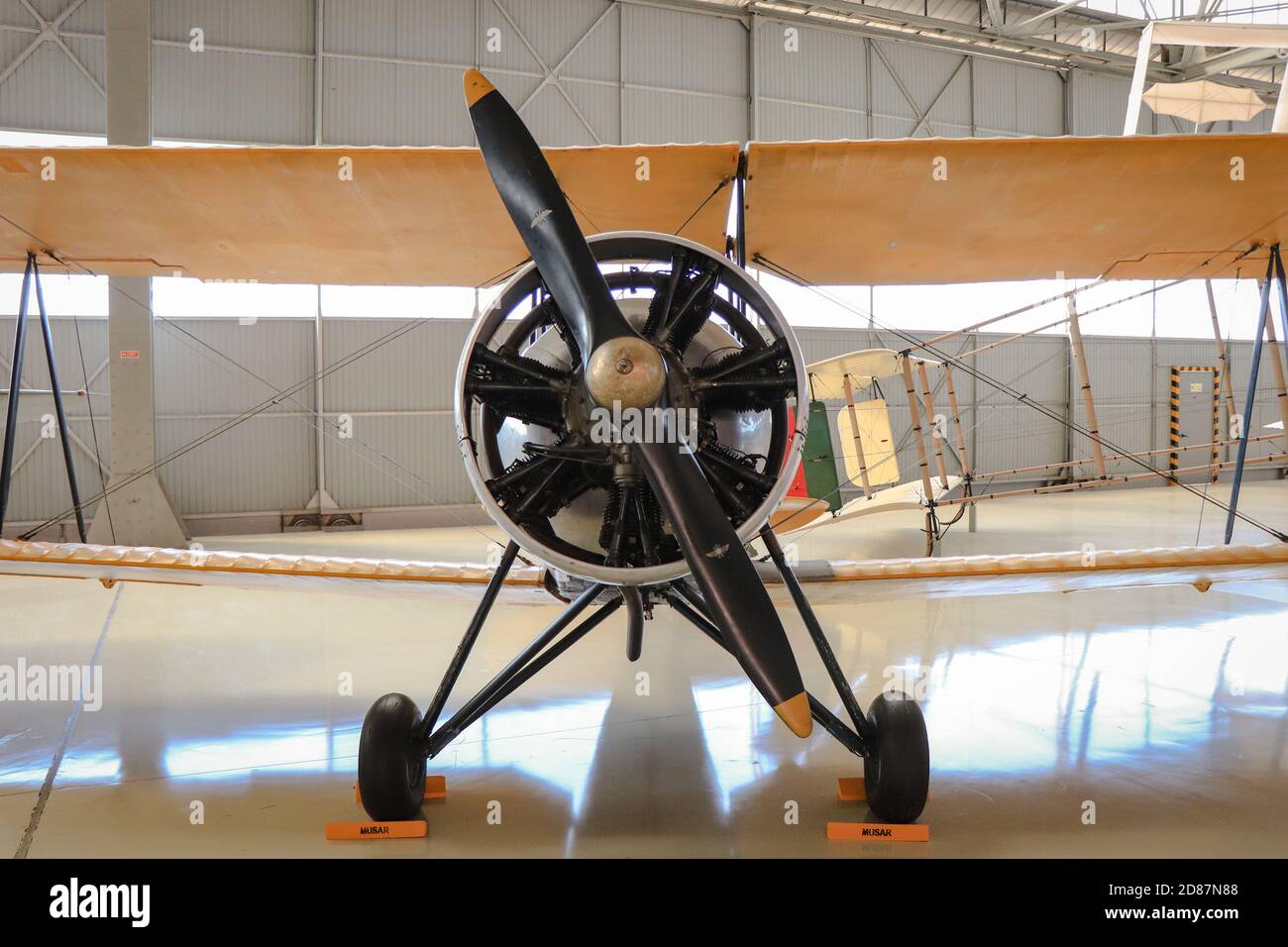 Old propeller plane in a hangar Stock Photo - Alamy