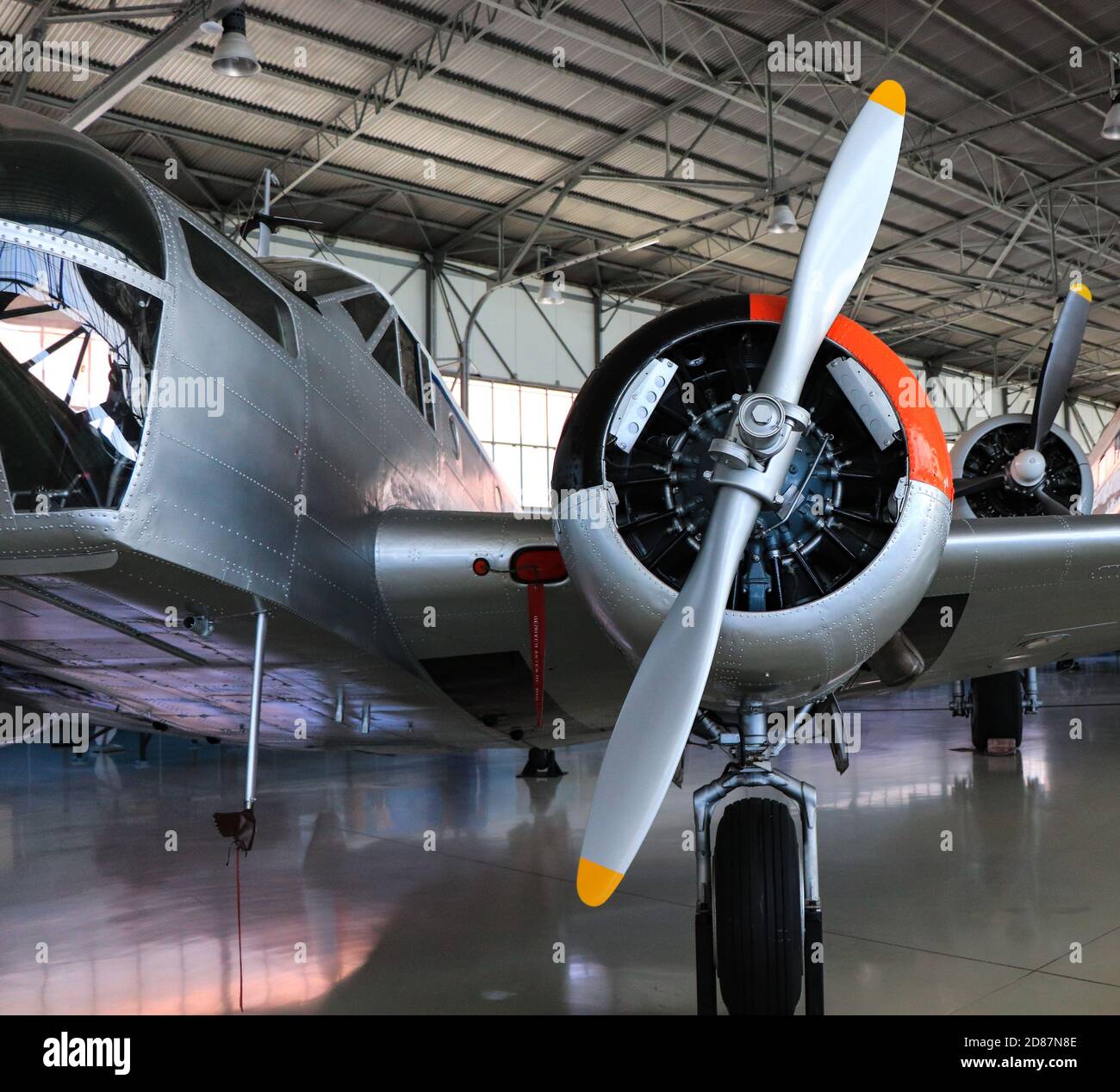 Old propeller plane in a hangar Stock Photo - Alamy