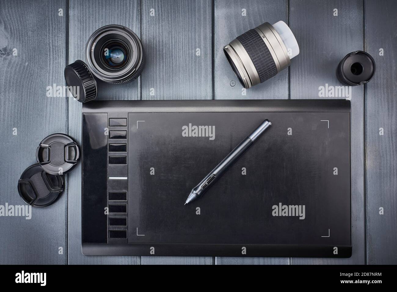 basic tools of a photographer or graphic designer. Photographic lenses ...