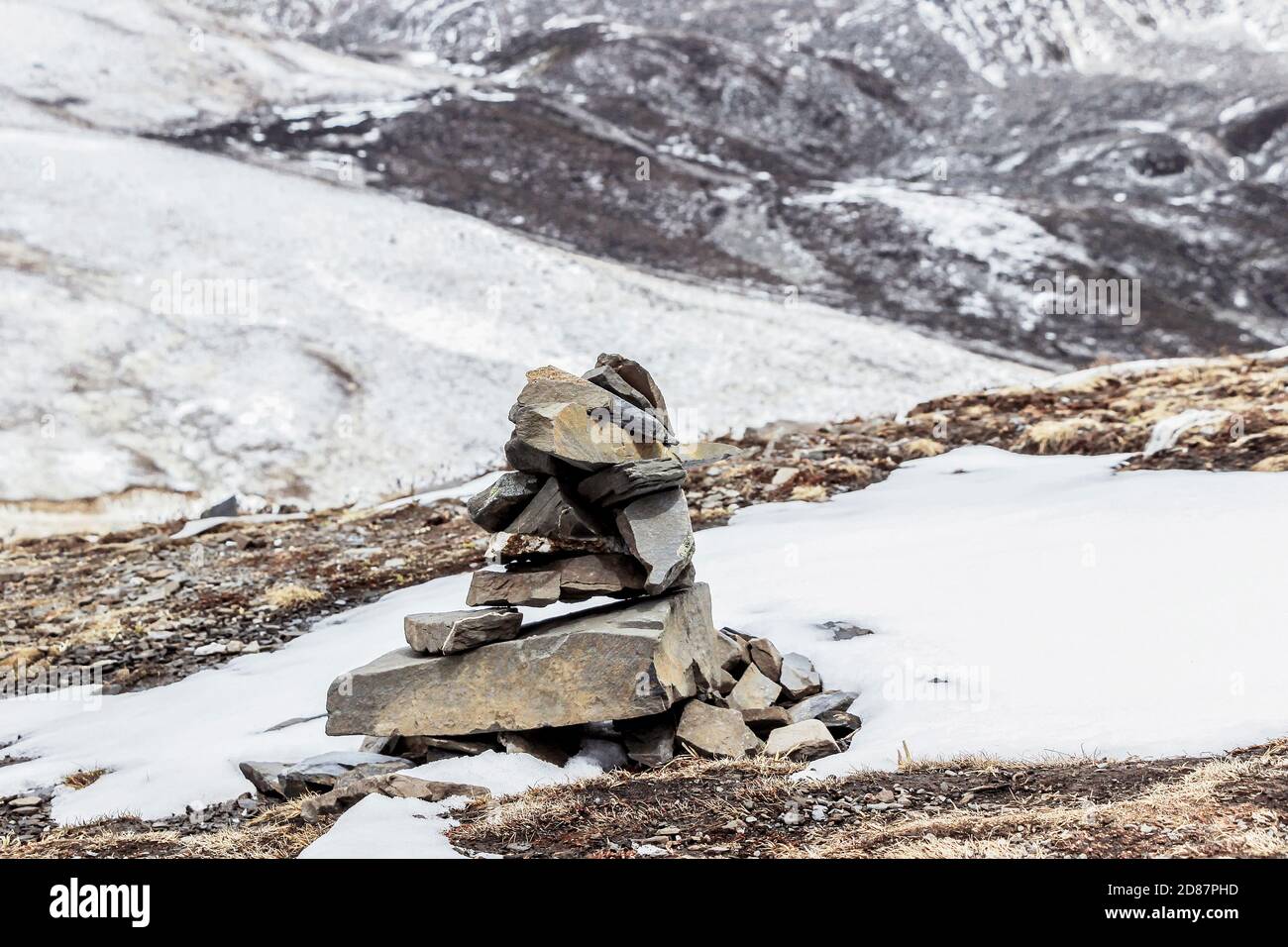 landscape of stone heap on snow mountain Stock Photo - Alamy