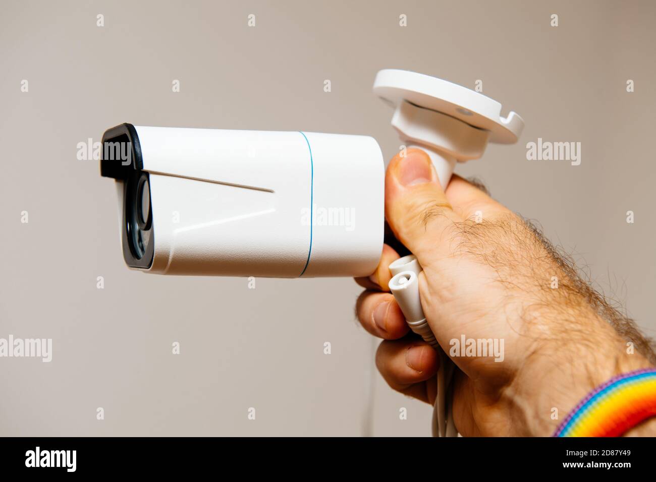 POV male hand holding against home window background new CCTV ...