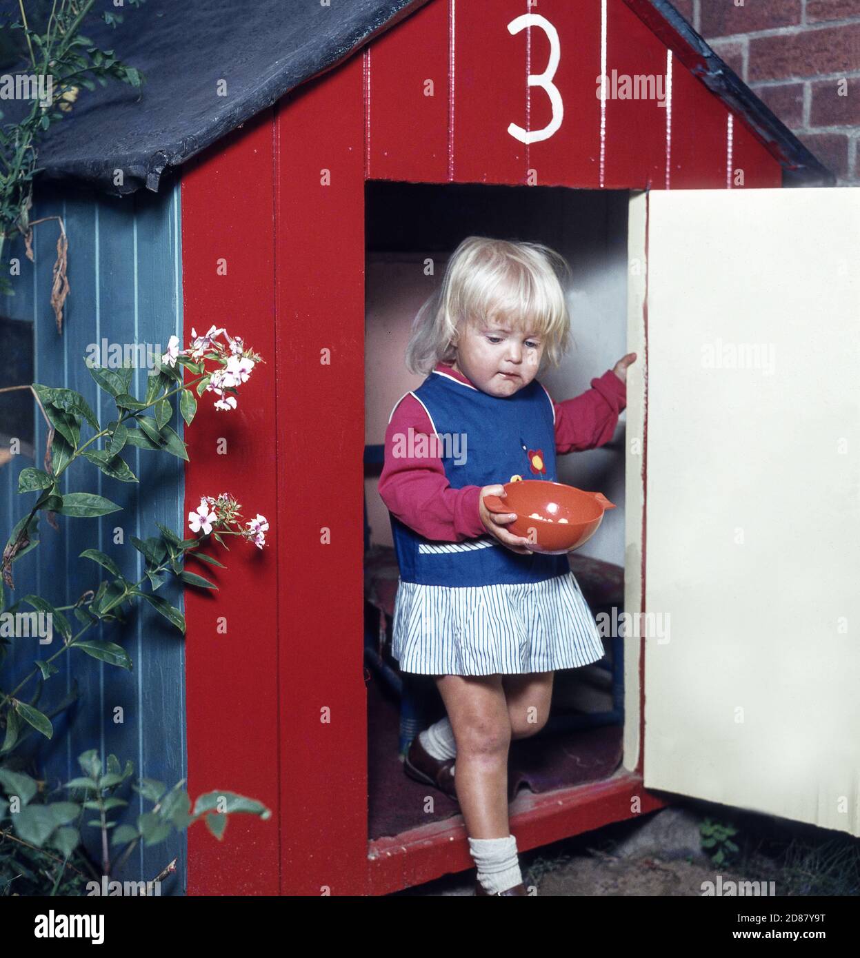 Boys and girl playing with magazines hi-res stock photography and ...