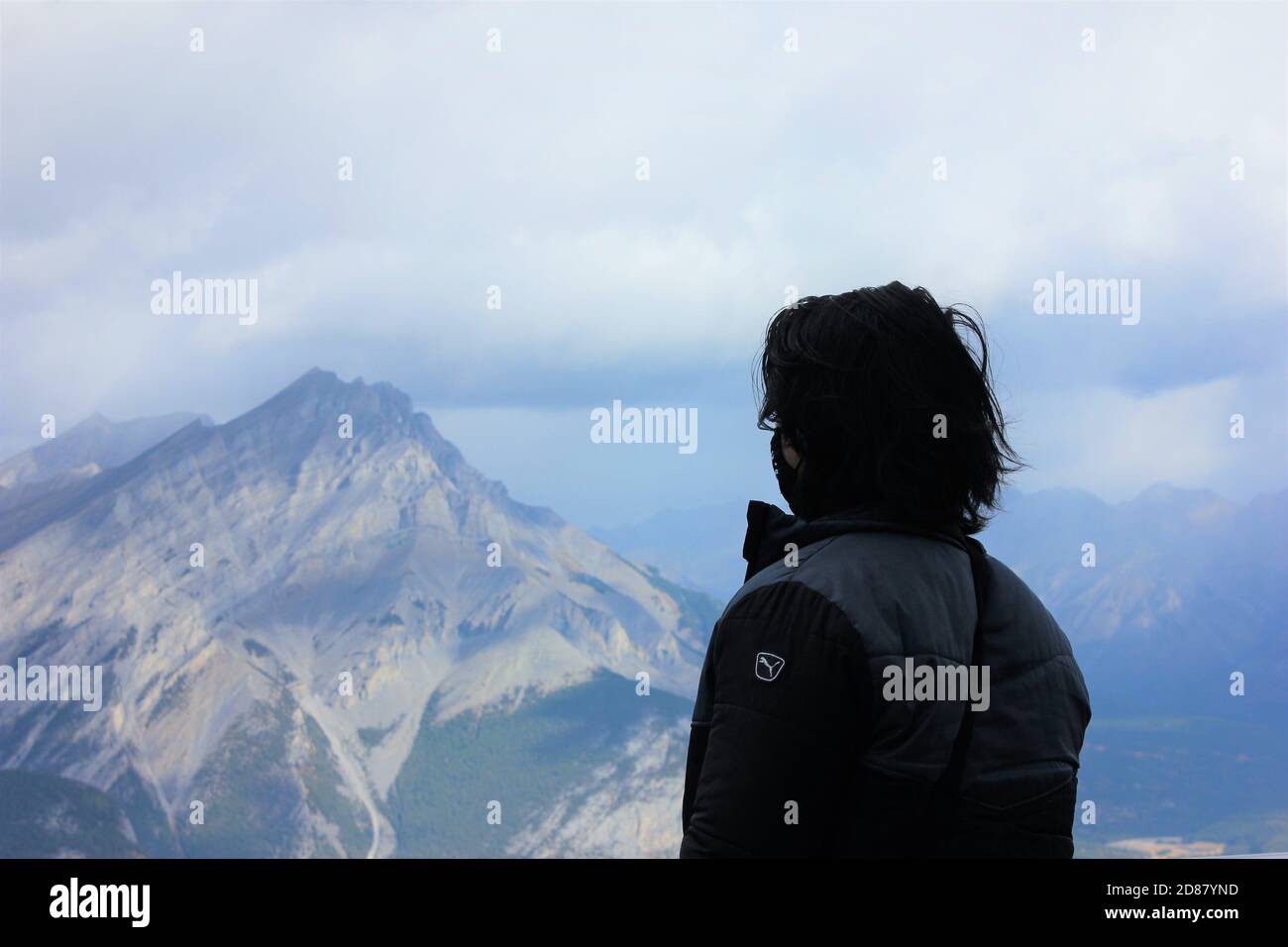 Views of nature: a man facing the breathtaking scale of the Rockies in ...