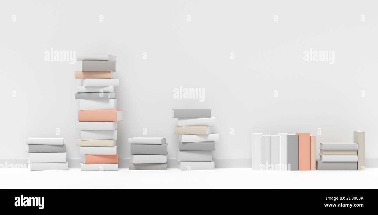 Multiple book stacks in front of white wall in room with white floor ...