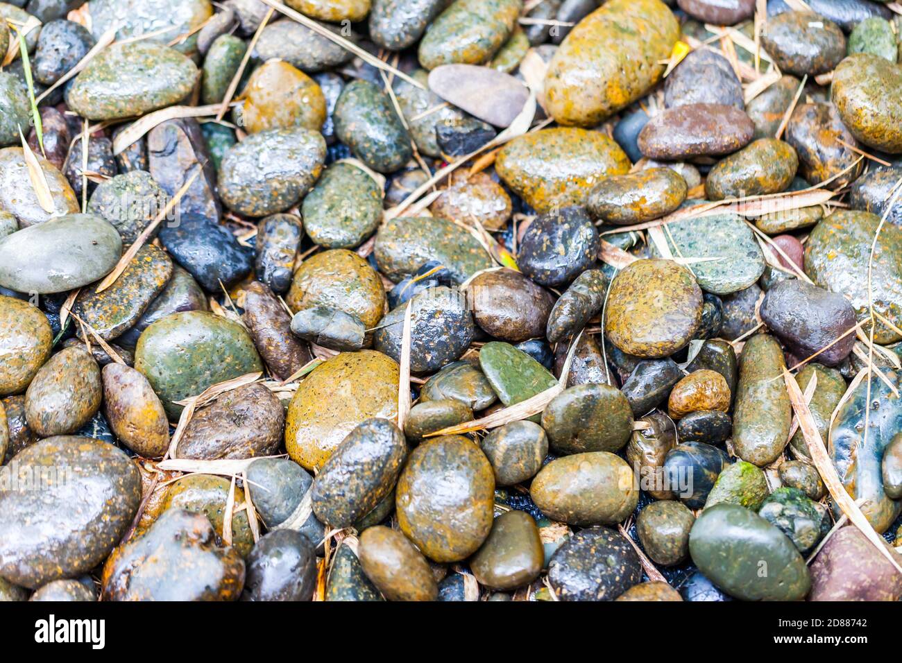 Raining river stones for background Stock Photo - Alamy