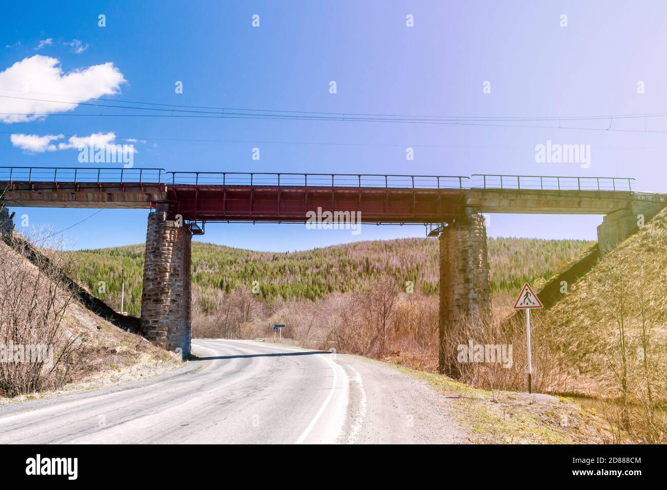 Old railway bridge over the road Stock Photo - Alamy