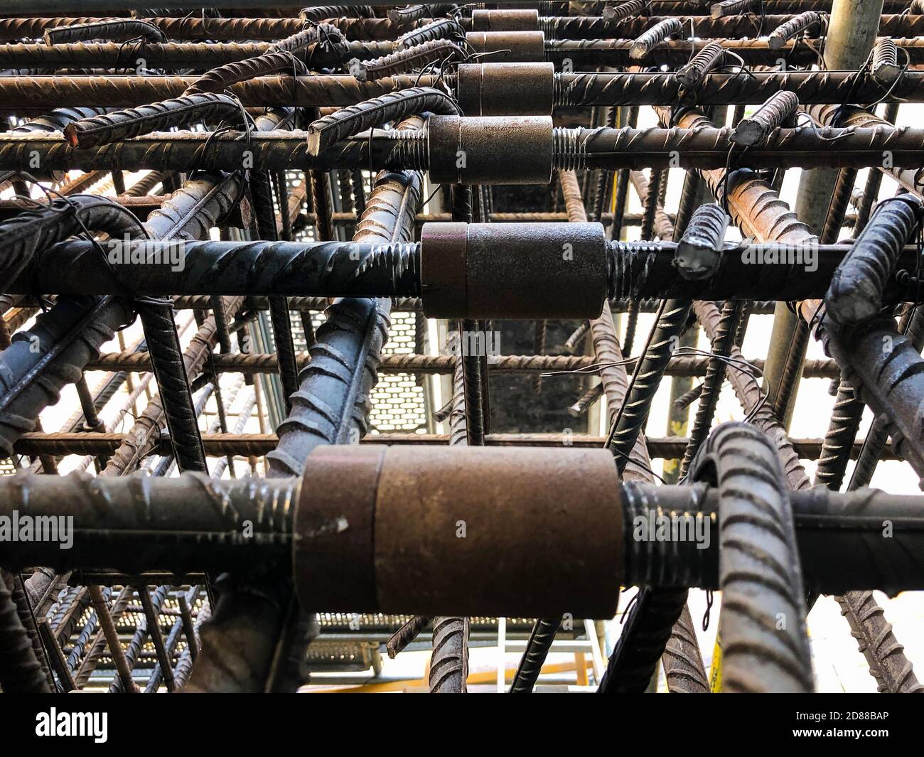 Metal threaded couplings connecting reinforcing rebars. Reinforcement ...