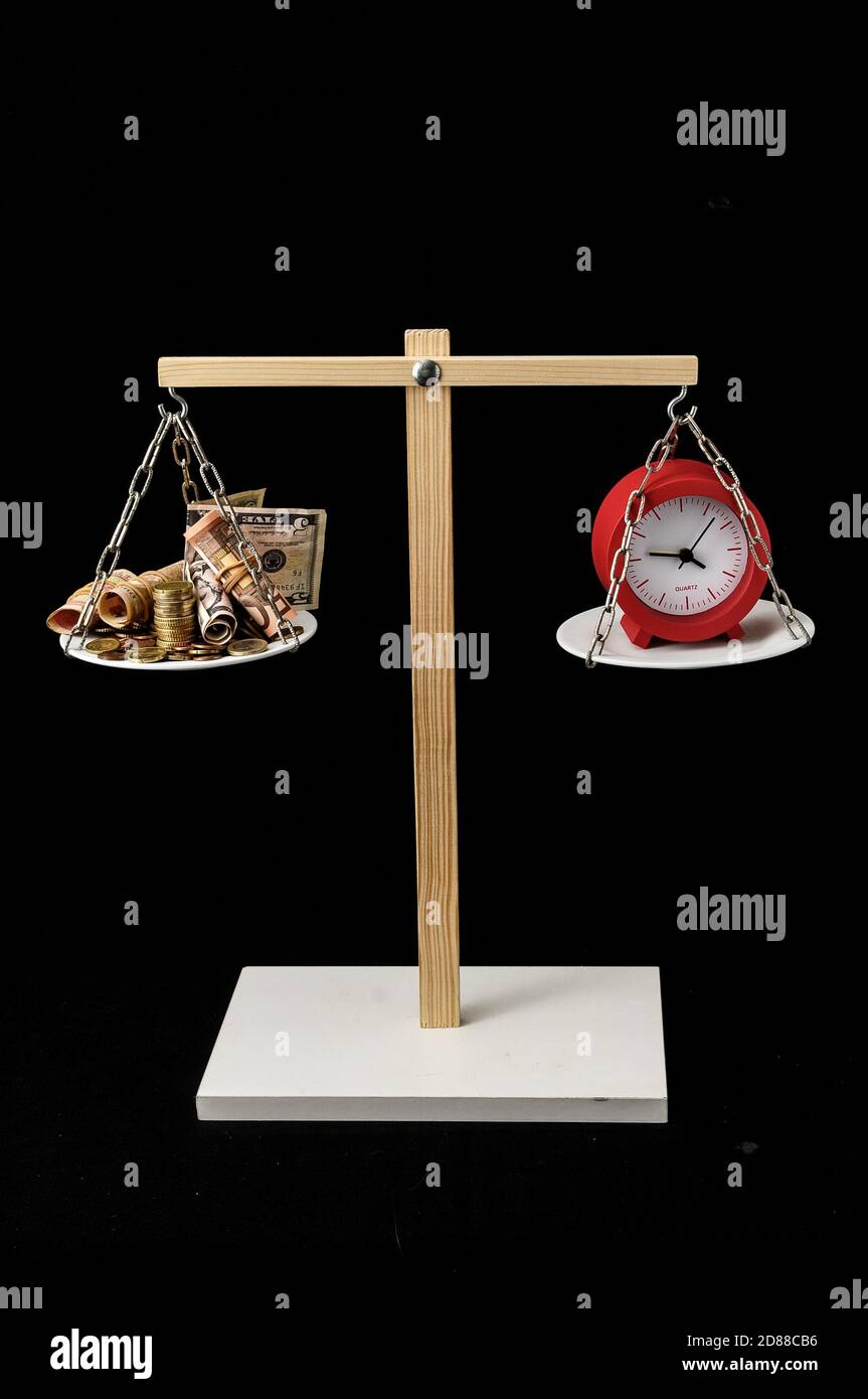 Clock and Currency Time is Money Concept Stock Photo - Alamy