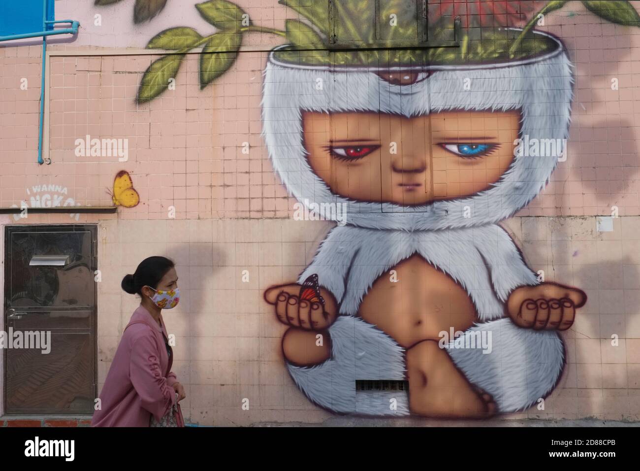 A mural by artist Alex Face on a house in Phahurat, Bangkok, Thailand ...