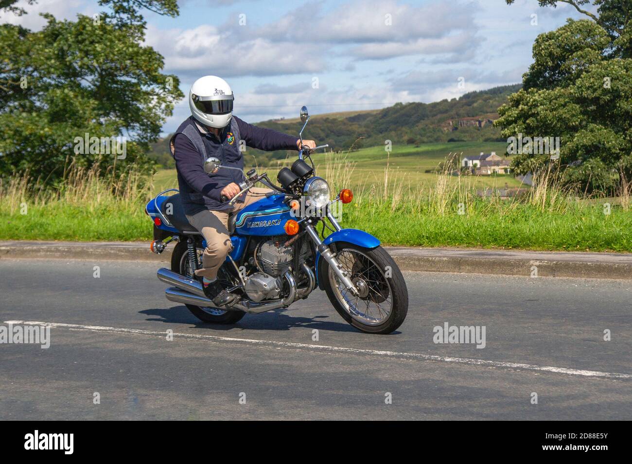 1972 70s blue Kawasaki; 748cc Motorbike rider; two wheeled transport ...