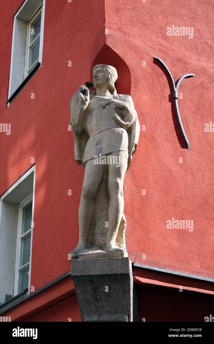 A medieval male figure adorns the corner of the Swarovski glass company ...