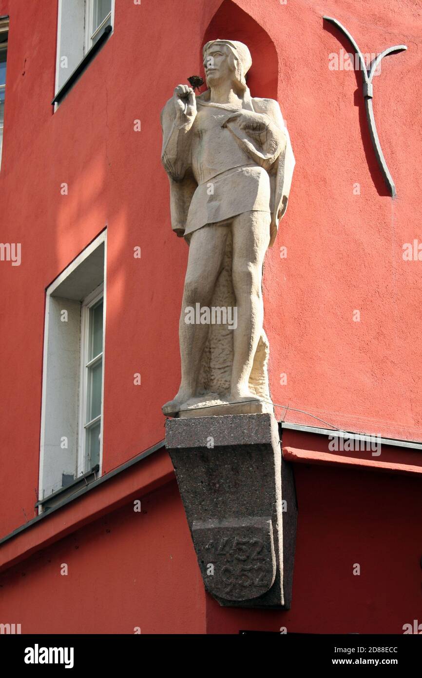 A medieval male figure adorns the corner of the Swarovski glass company ...