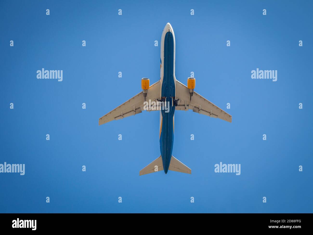 Plane flies in the sky. Bottom view. Takeoff and landing. Arrival and ...