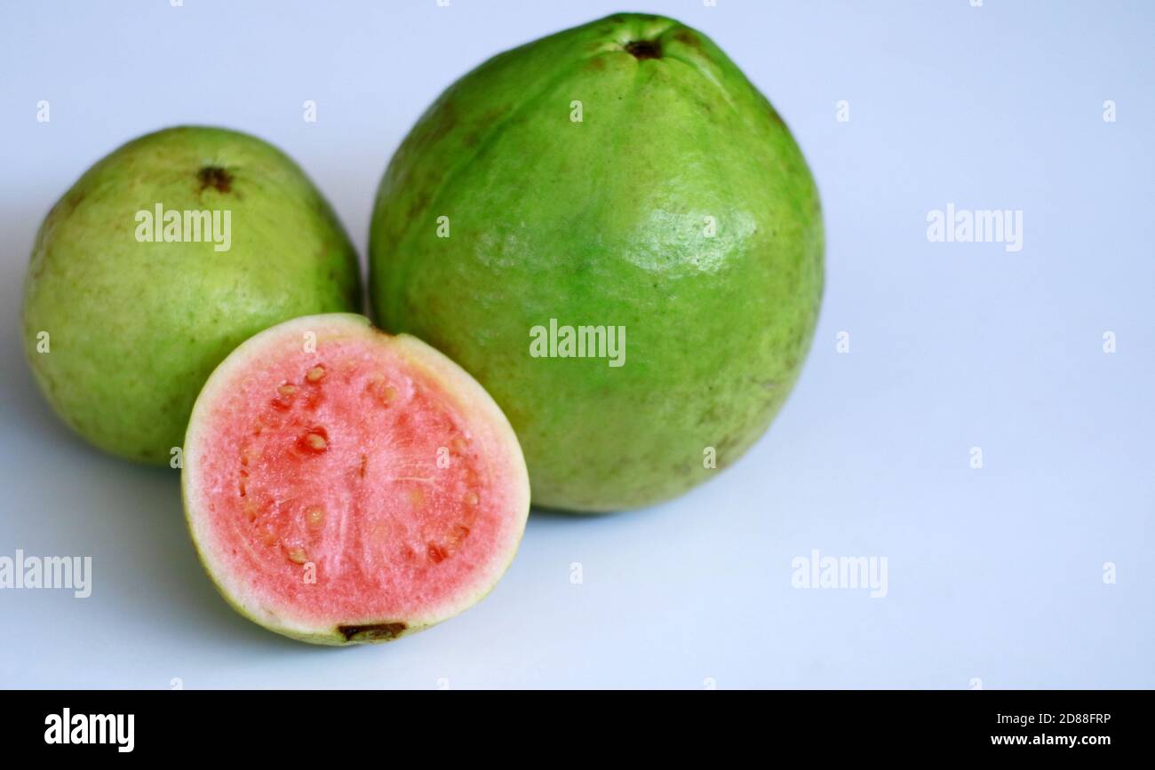 Red guava or common guava on white background Stock Photo - Alamy