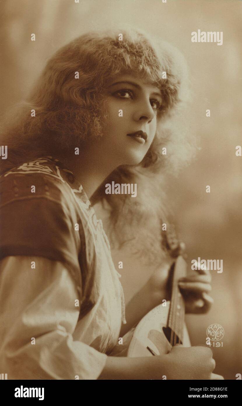 Girl With Mandolin High Resolution Stock Photography and Images - Alamy