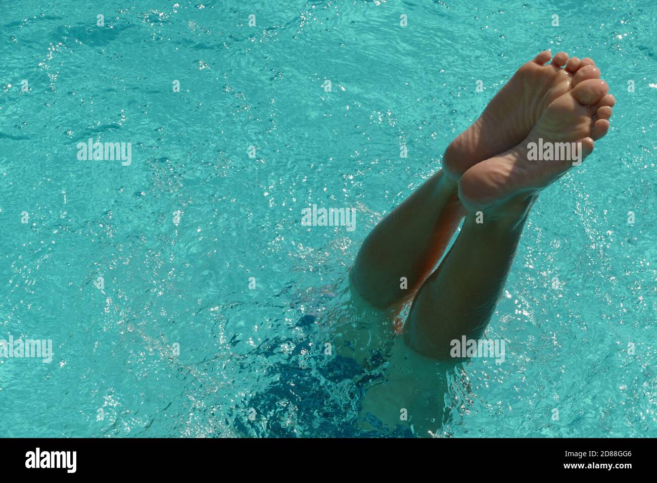 Diving in the swimming pool Stock Photo - Alamy