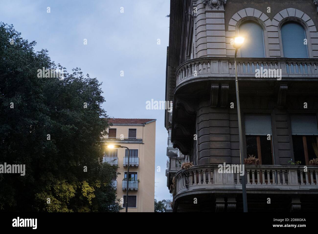 Milano, Italy. Facades of old elegant buildings at sunset Stock Photo ...