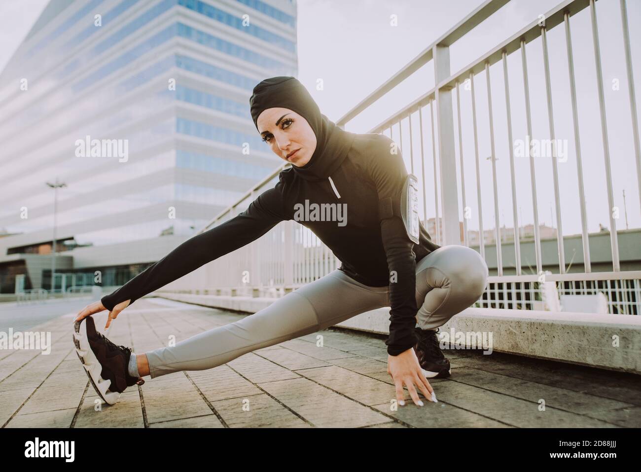 Muslim sportive girl with fit body training outside - Beautiful woman ...