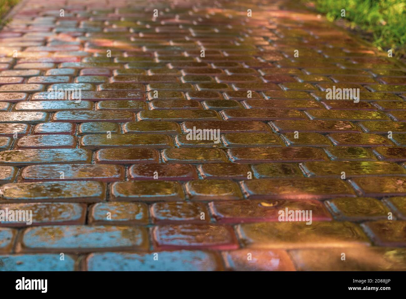 pink paving slab after rain for background Stock Photo - Alamy