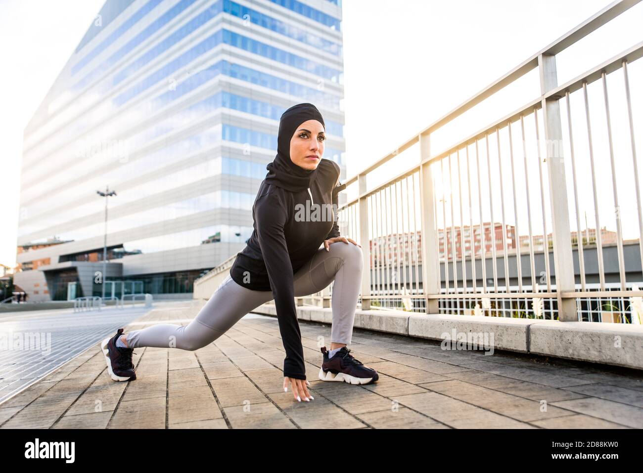 Muslim sportive girl with fit body training outside - Beautiful woman ...