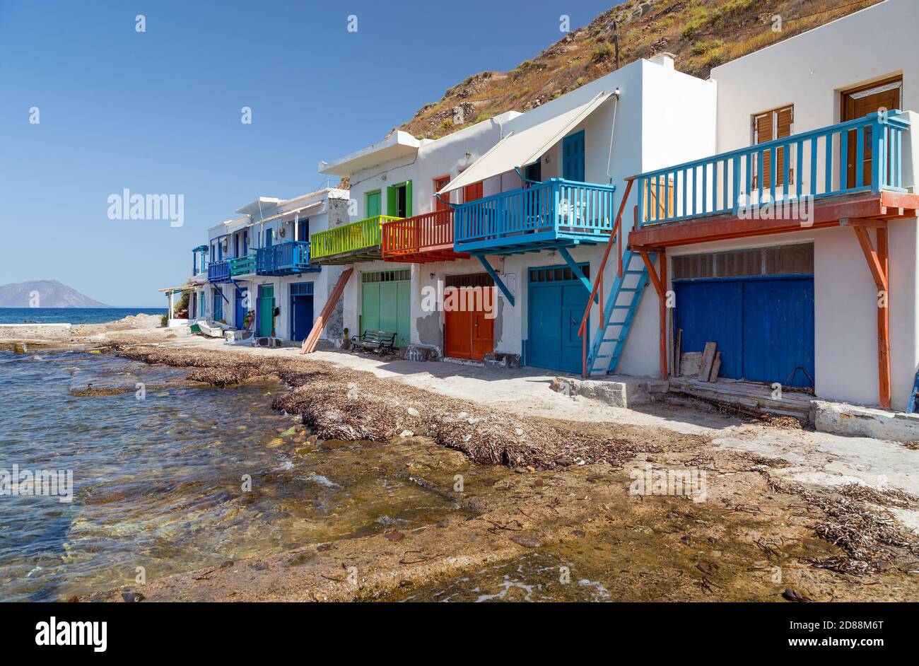 Traditional boathouses in Klima fishing village, Milos island, Greece ...