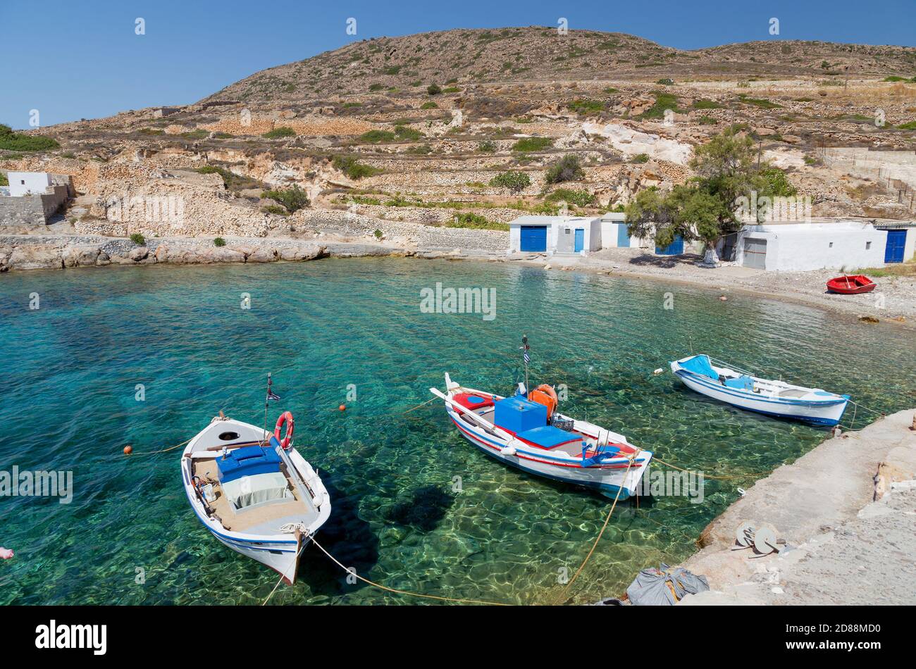 Traditional fishing boats in Ag. Nikolas bay, Kimolos island, Cyclades ...